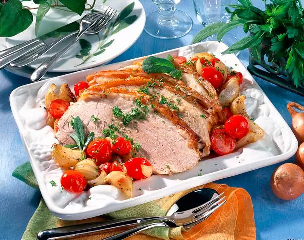 Recette de Rôti de croûte de porc aux légumes tomates et oignons 7596_1