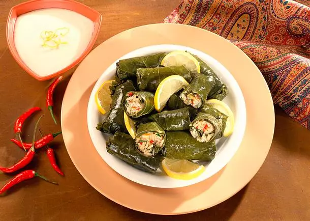 Stuffed grape leaves with yoghurt sauce recipe 7815_1